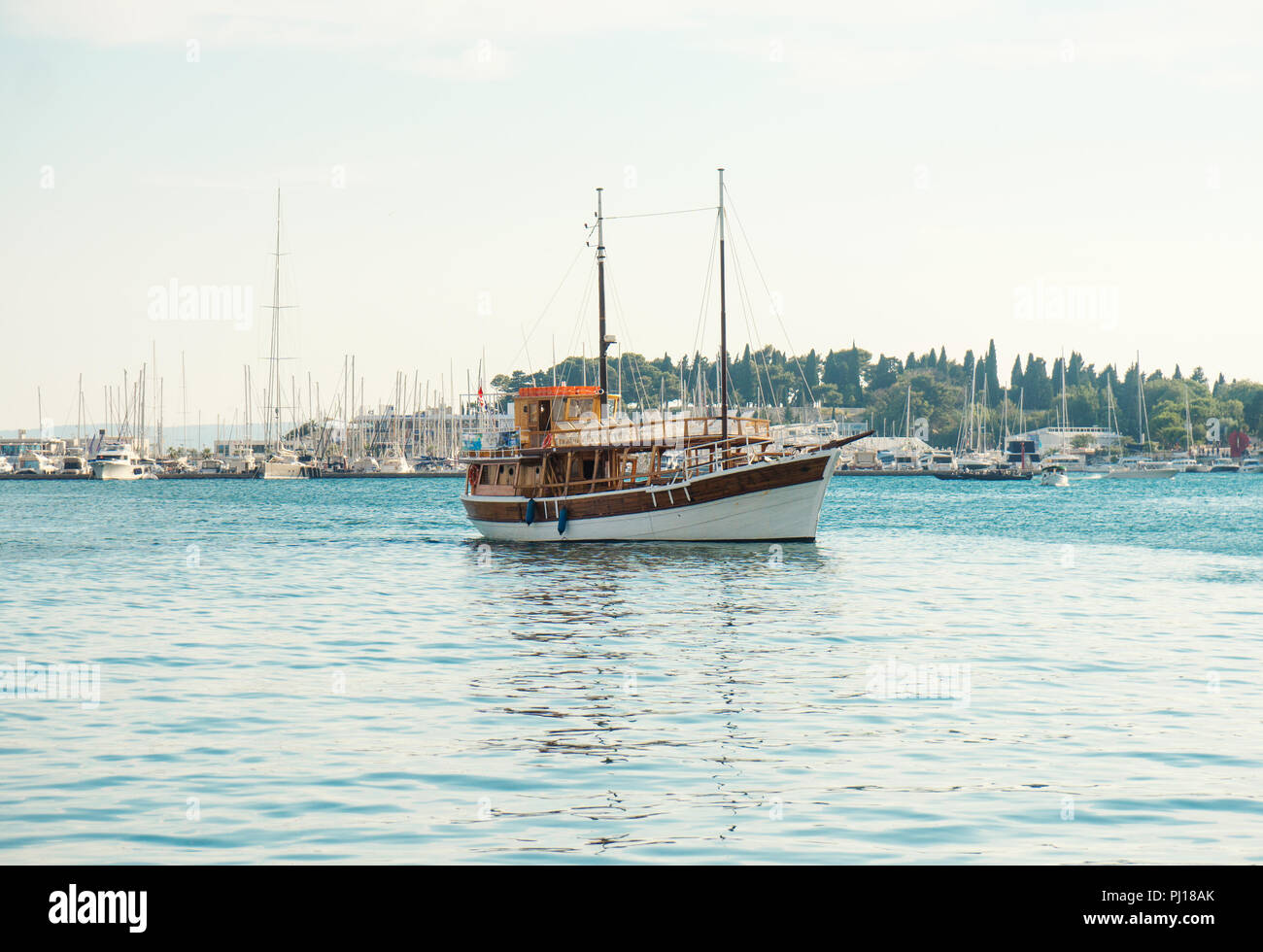 Passenger tourist boat sailing in the sea Stock Photo - Alamy