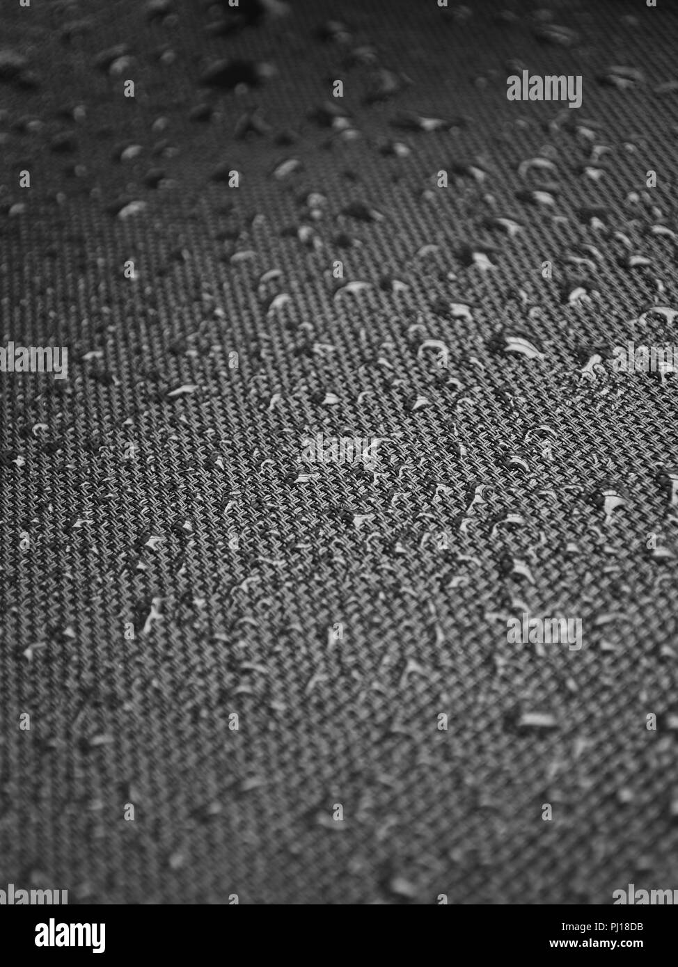Water drops on the fabric texture. wet textile texture. cloth with ...
