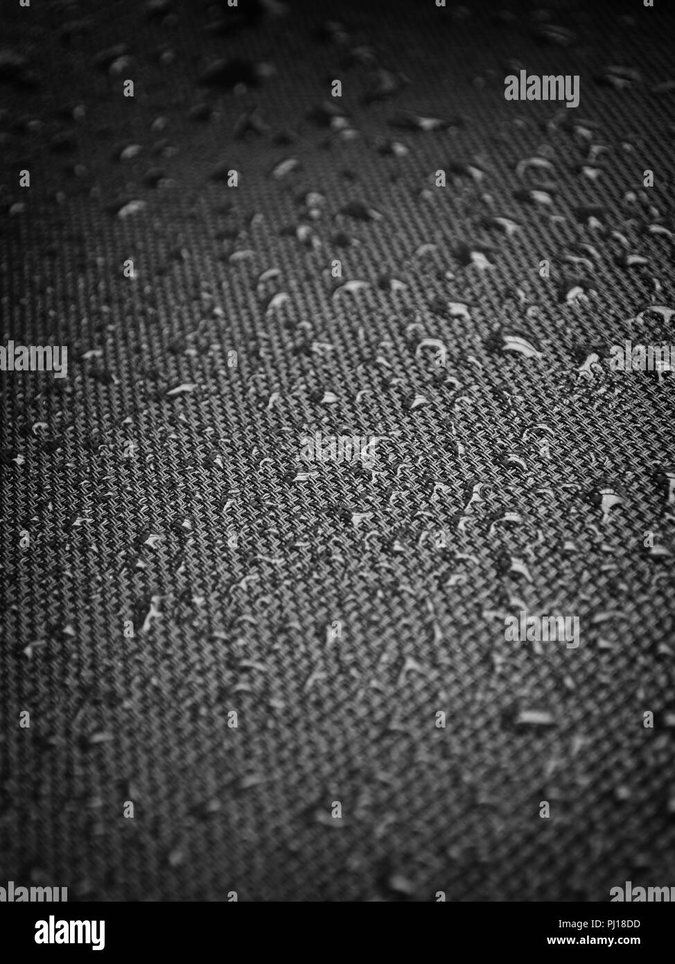 Water drops on the fabric texture. wet textile texture. cloth with ...