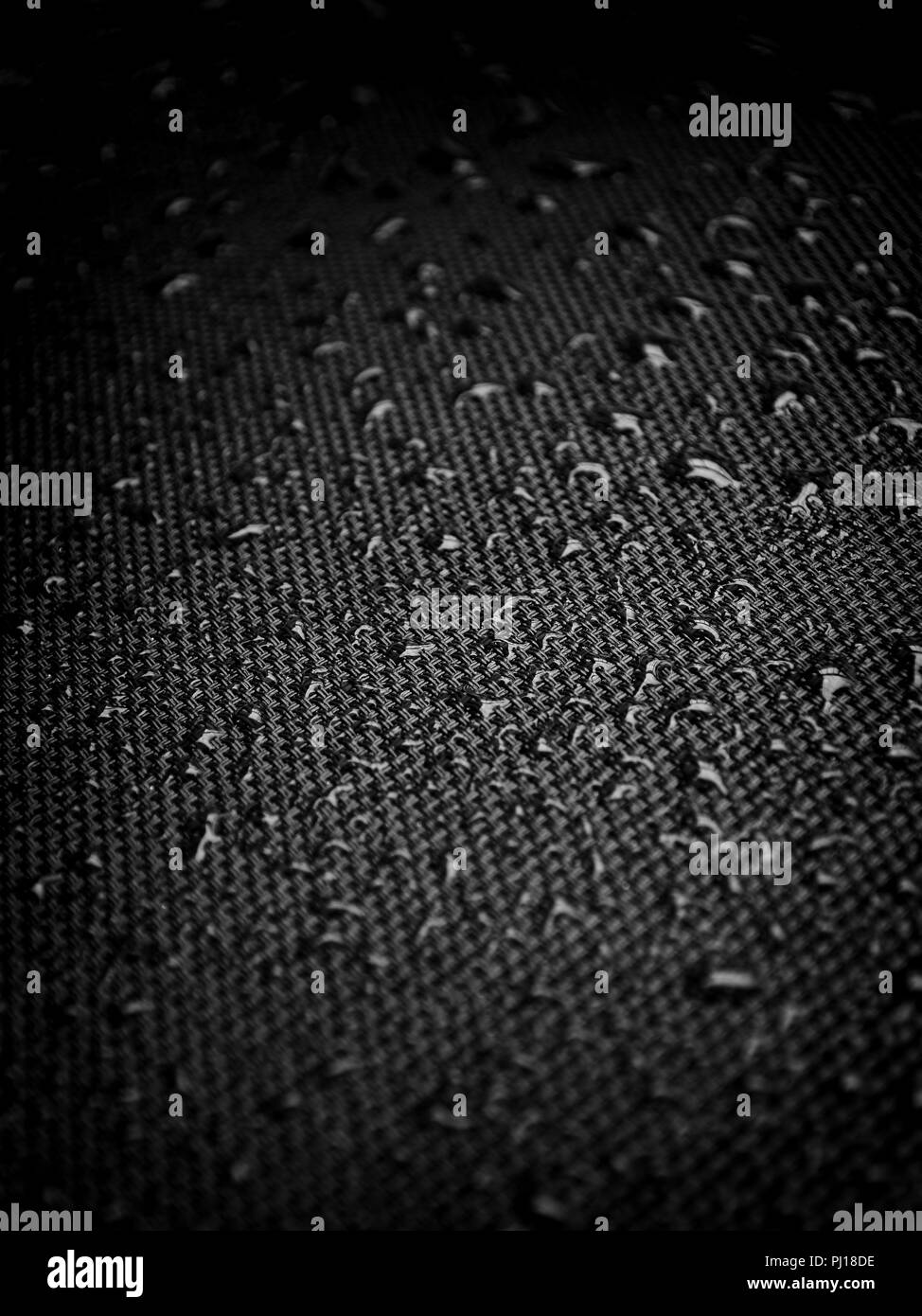 Water drops on the fabric texture. wet textile texture. cloth with ...