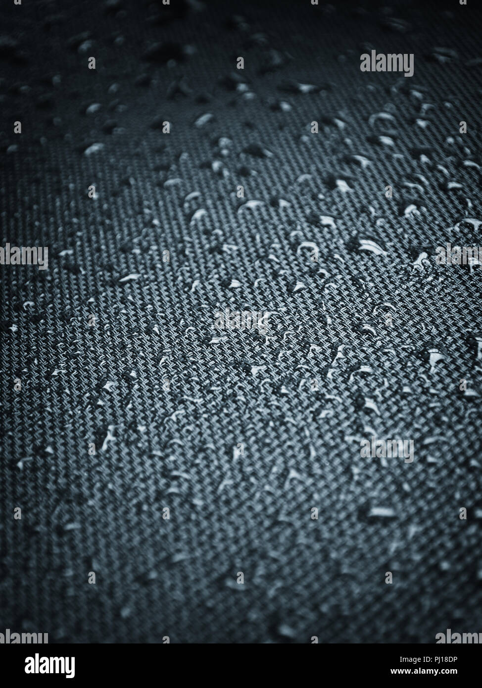 Water drops on the fabric texture. wet textile texture. cloth with ...