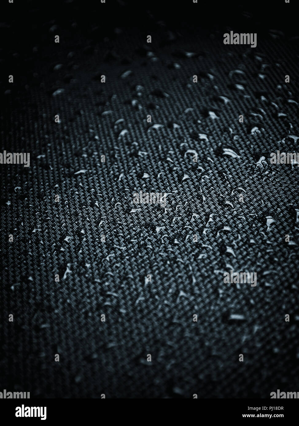 Water drops on the fabric texture. wet textile texture. cloth with ...