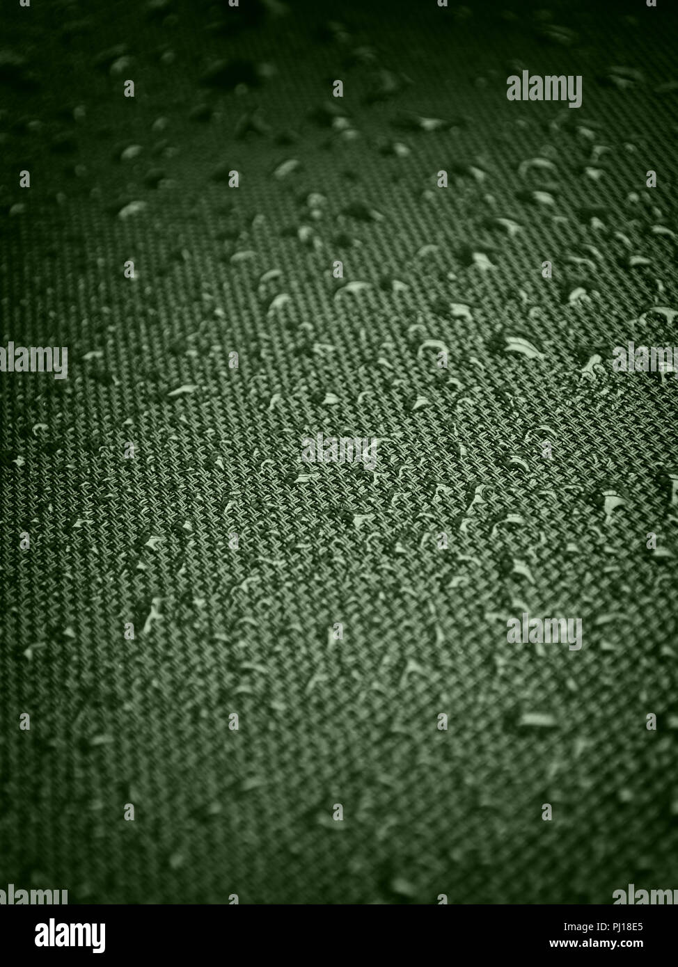 Water drops on the fabric texture. wet textile texture. cloth with ...