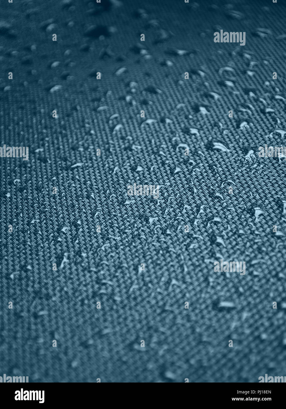 Water drops on the fabric texture. wet textile texture. cloth with ...