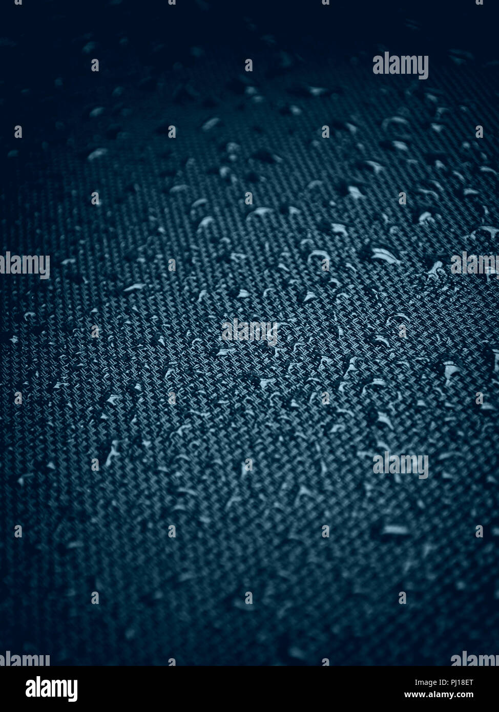 Water drops on the fabric texture. wet textile texture. cloth with ...