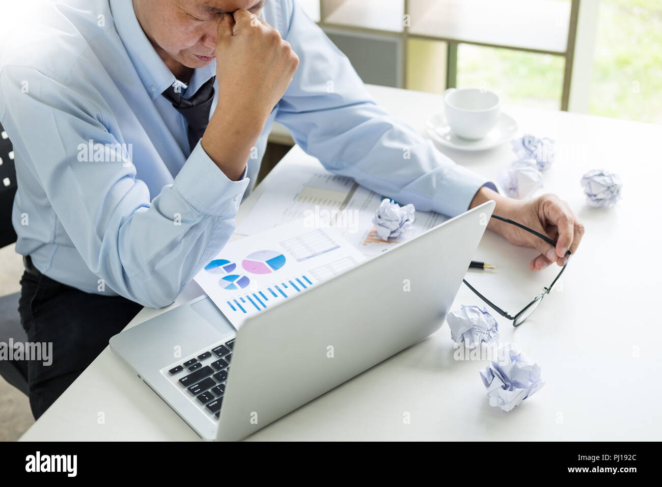 Depressed failure and tired businessman late sad and solving problem in ...