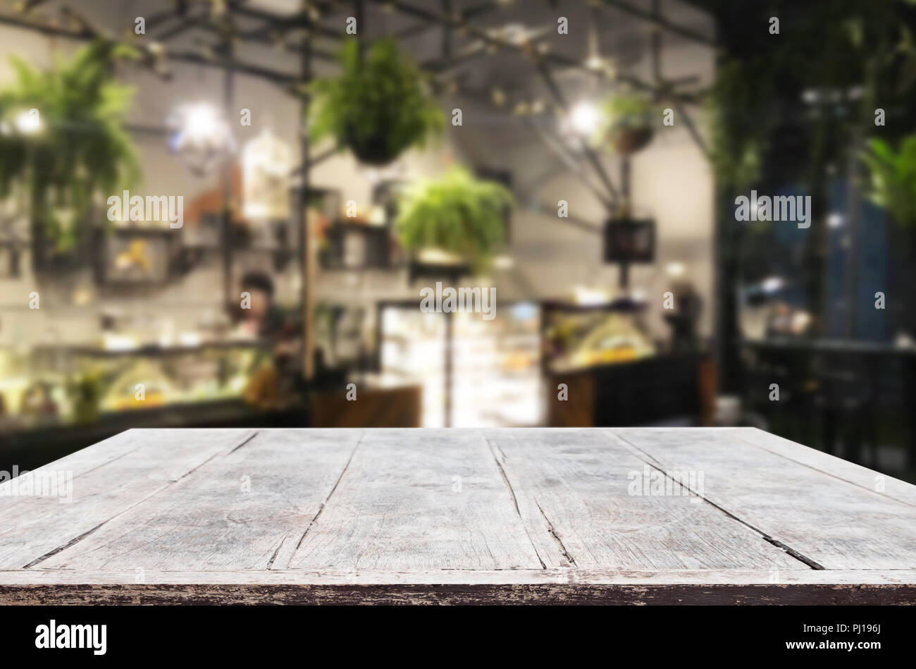 Selected focus empty brown wooden table and Coffee shop or restaurent ...