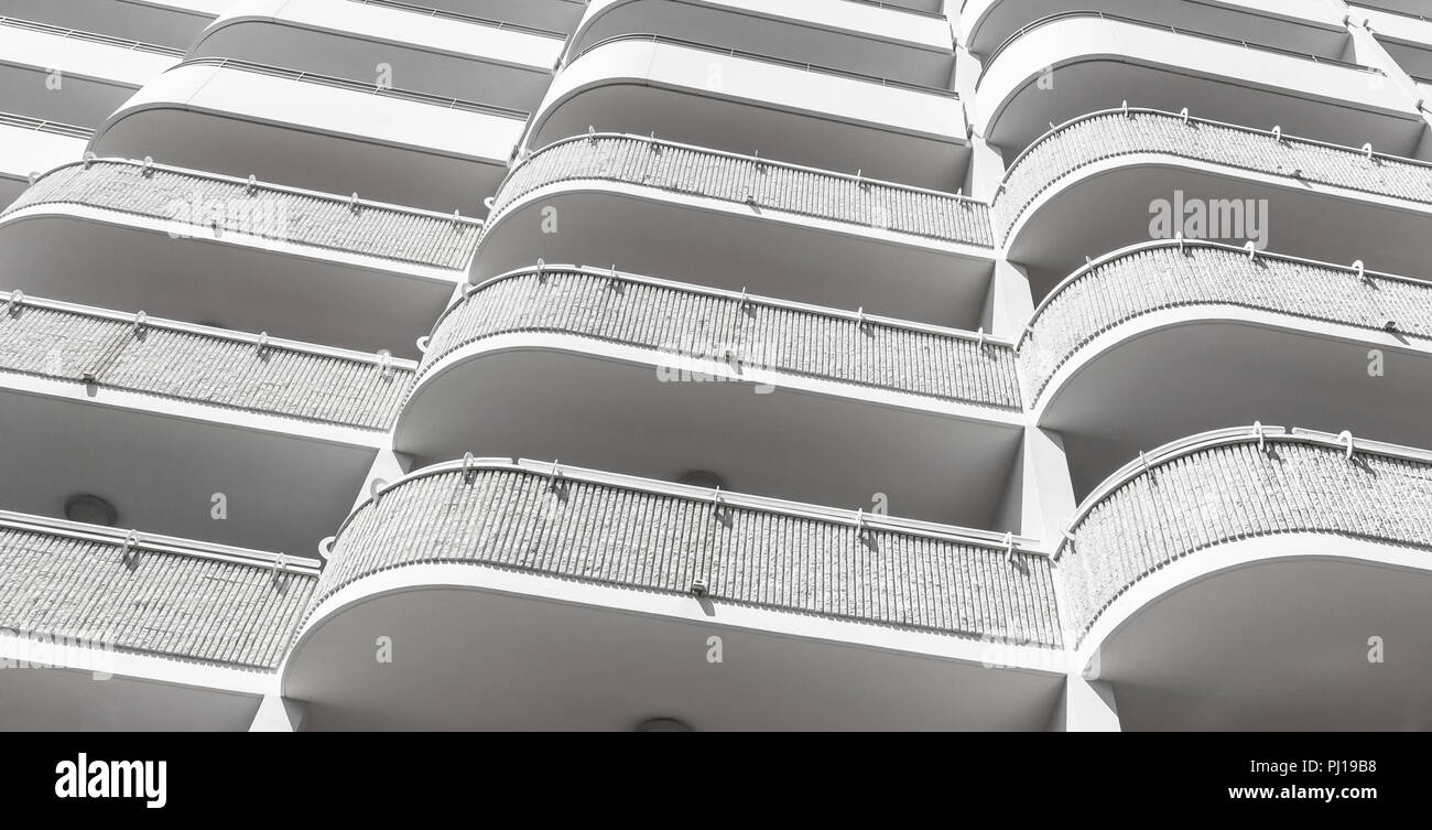 Modern beautiful hotel resort building with white balconies Stock Photo ...