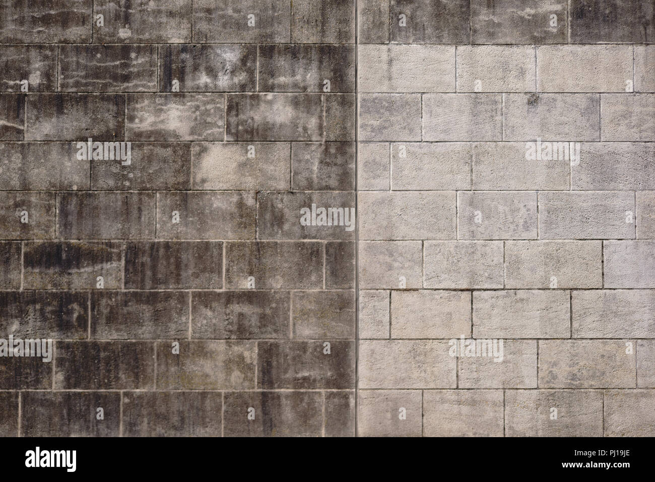 Weather and water residues are washed into a striking pattern on a wall ...