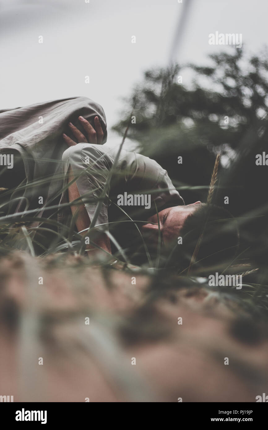 Man moving in nature forest Stock Photo - Alamy