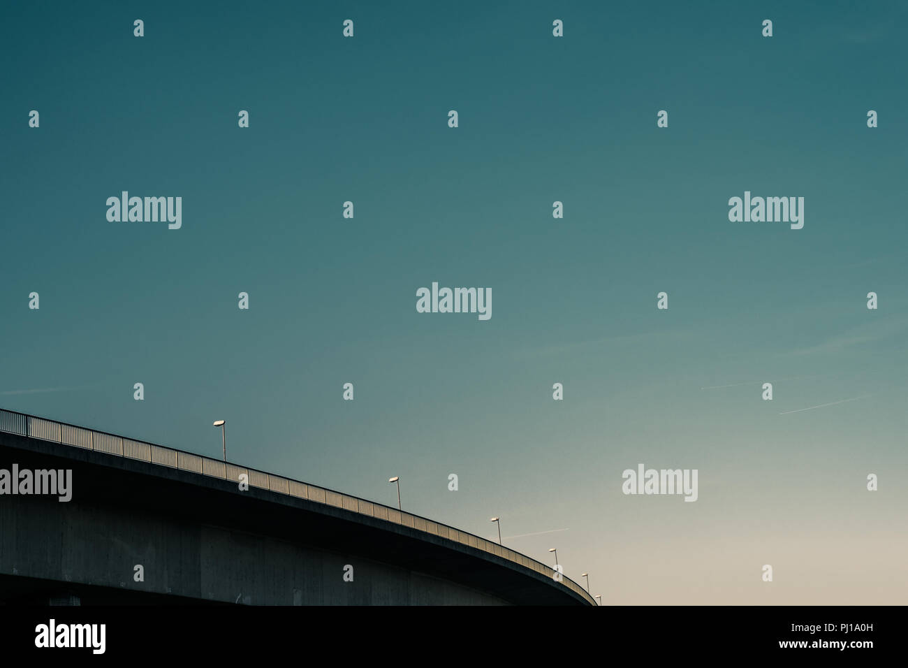 edge of a bridge with atmospheric sky Stock Photo - Alamy