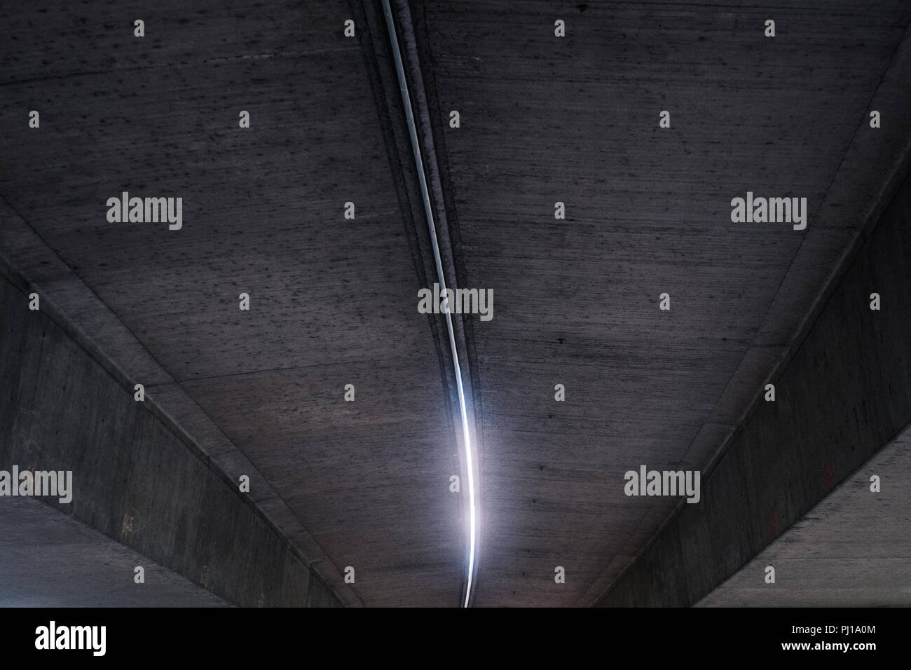 light passing a gap between a bridge Stock Photo - Alamy