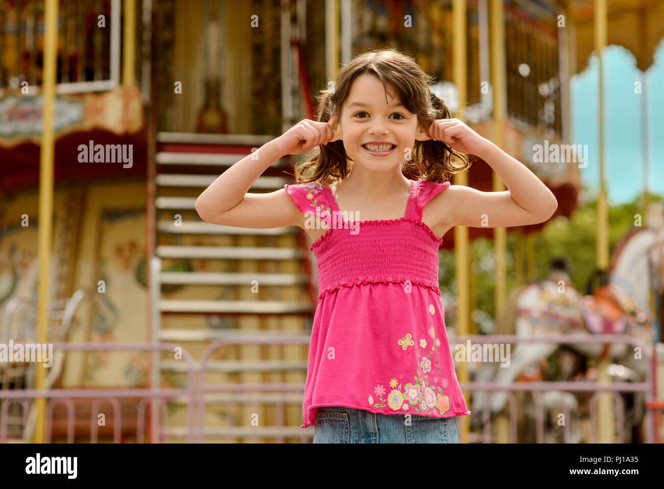 Little girl likes to make faces Stock Photo - Alamy