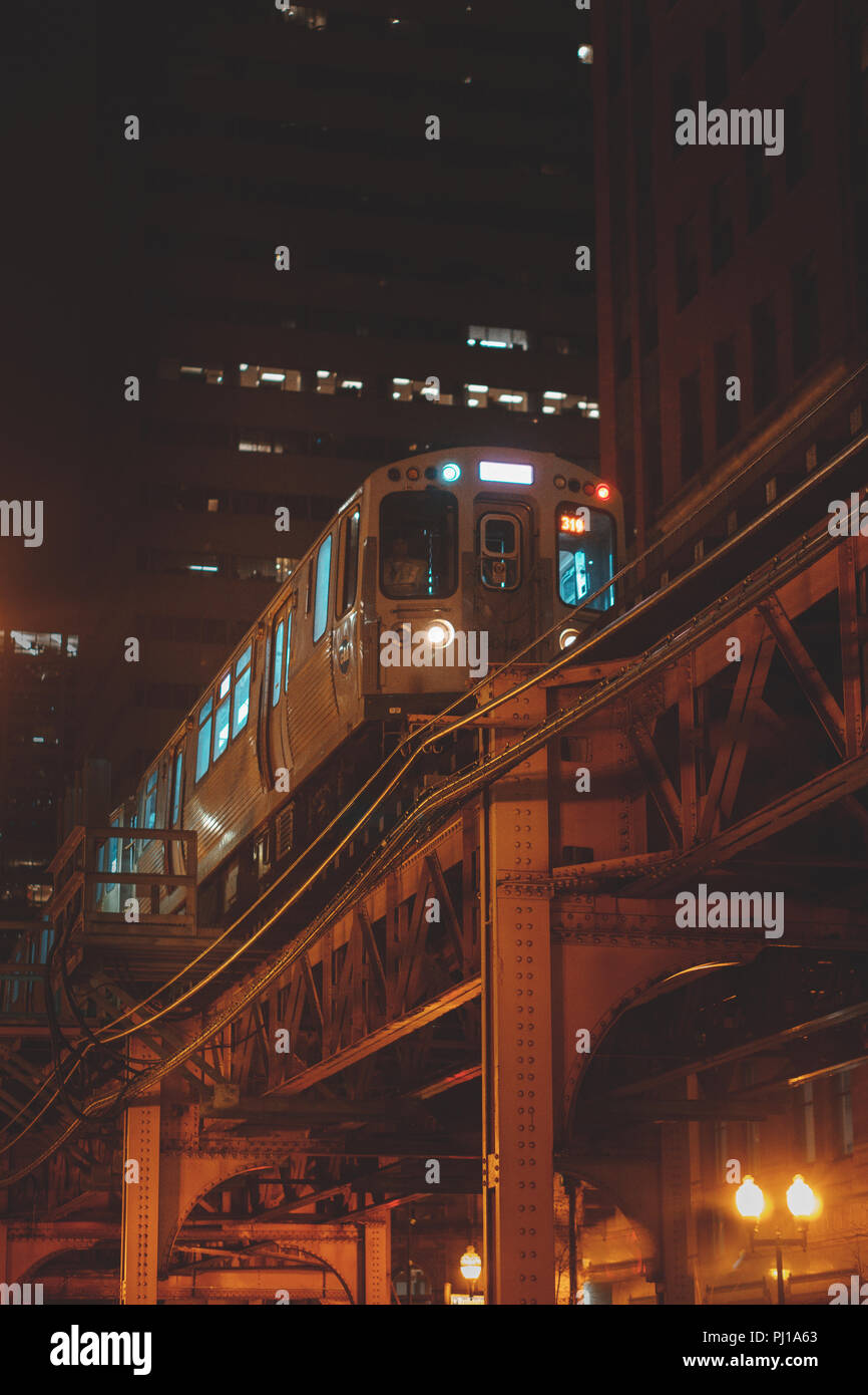 Train driving along elevated loop hi-res stock photography and images ...