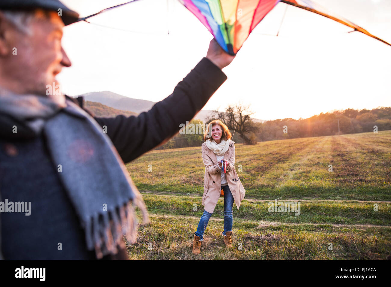 Old people flying kite hi-res stock photography and images - Alamy