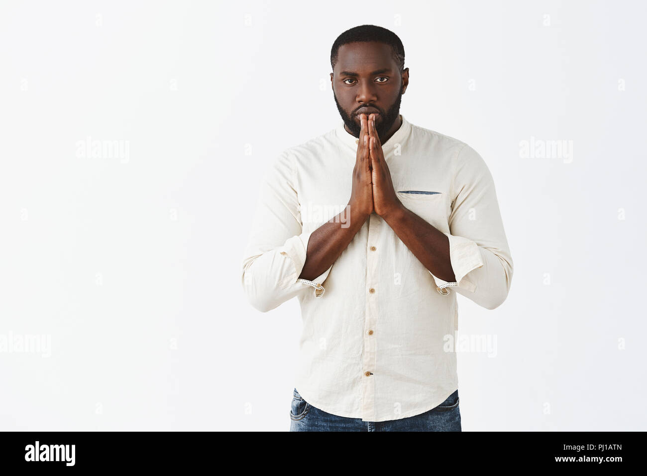 Studio shot of serious-looking strong and masculine African American ...