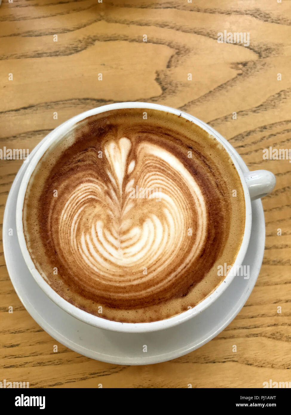 Overhead view of a cafe latte Stock Photo - Alamy