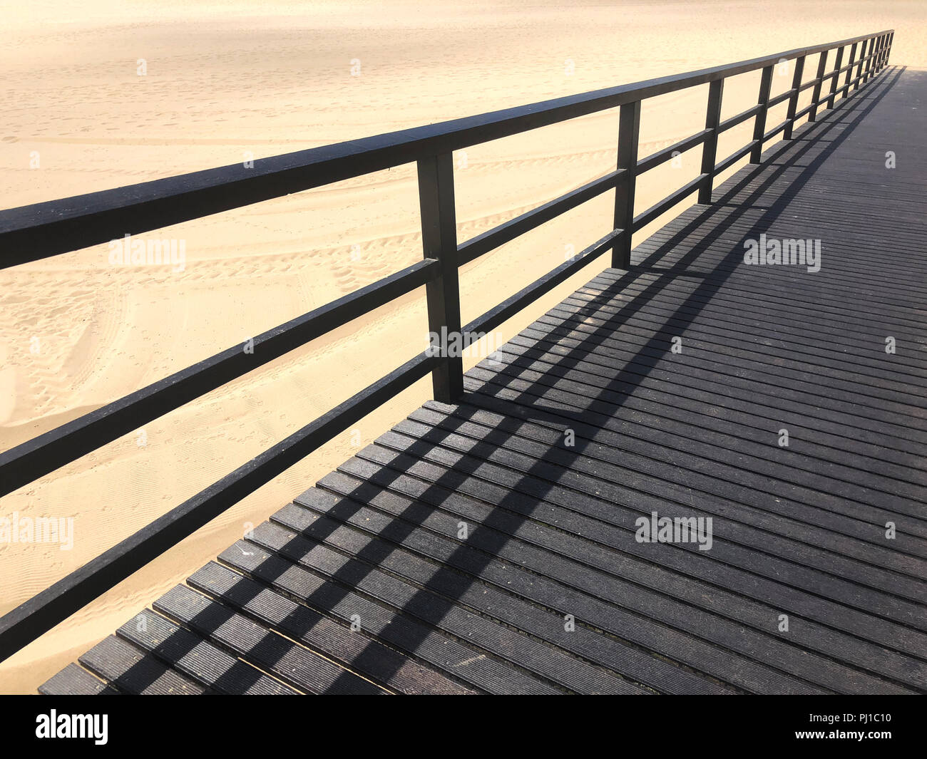 Wooden pier at the beach, Portugal Stock Photo - Alamy