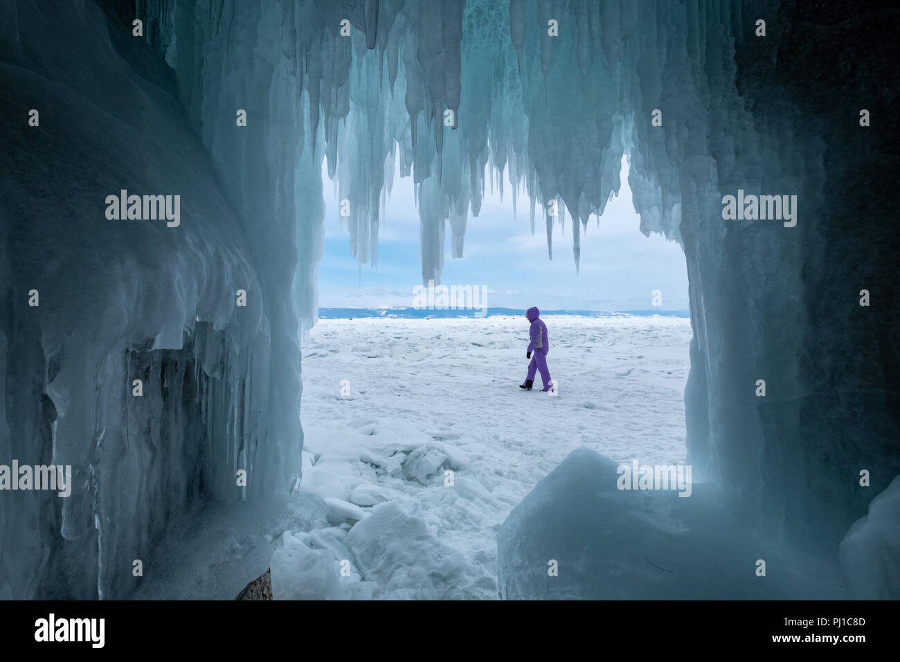 Man walking in a frozen landscape, Irkutsk Oblast, Siberia, Russia ...