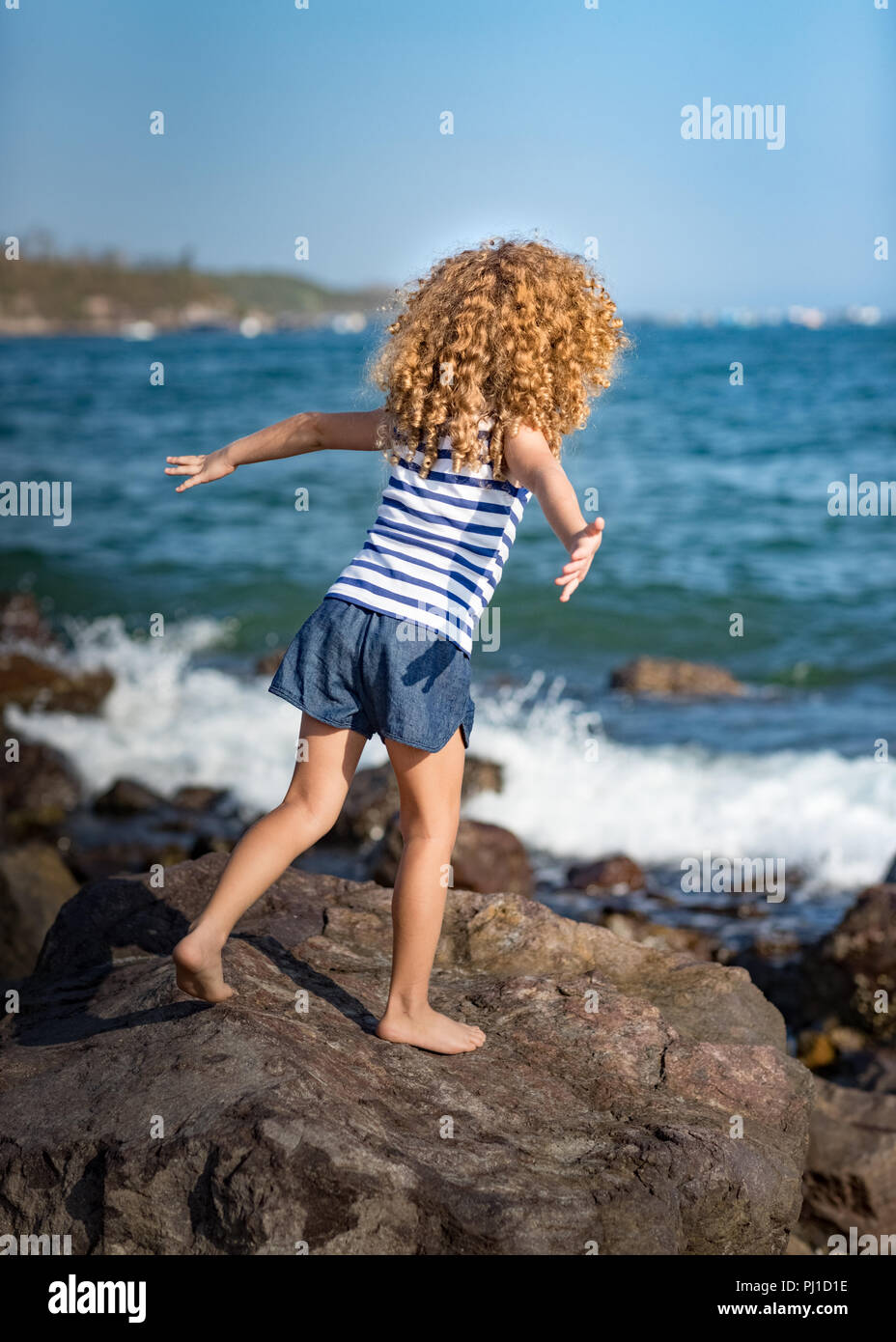 Little Girl Near The Sea Playing Stock Photo Alamy little-girl-near-the-sea-playing-stock-photo-alamy