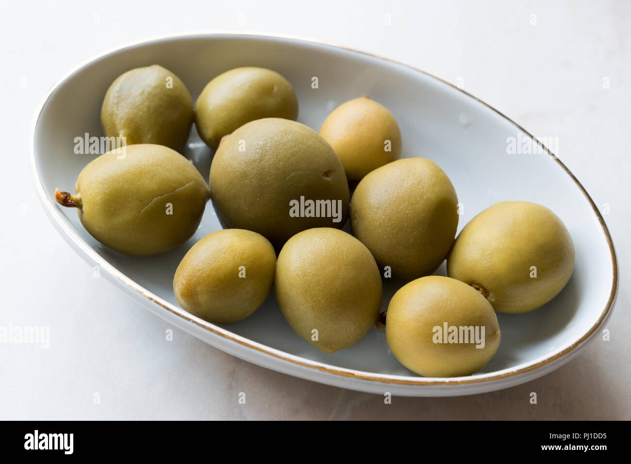 Pickled Unripe Green Almond Pickles in Plate / Cagla Badem. Organic ...