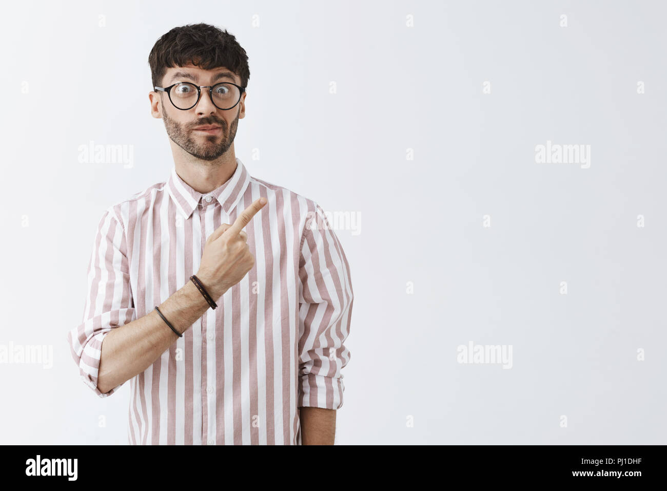 Eyebrows smirking studio hi-res stock photography and images - Alamy