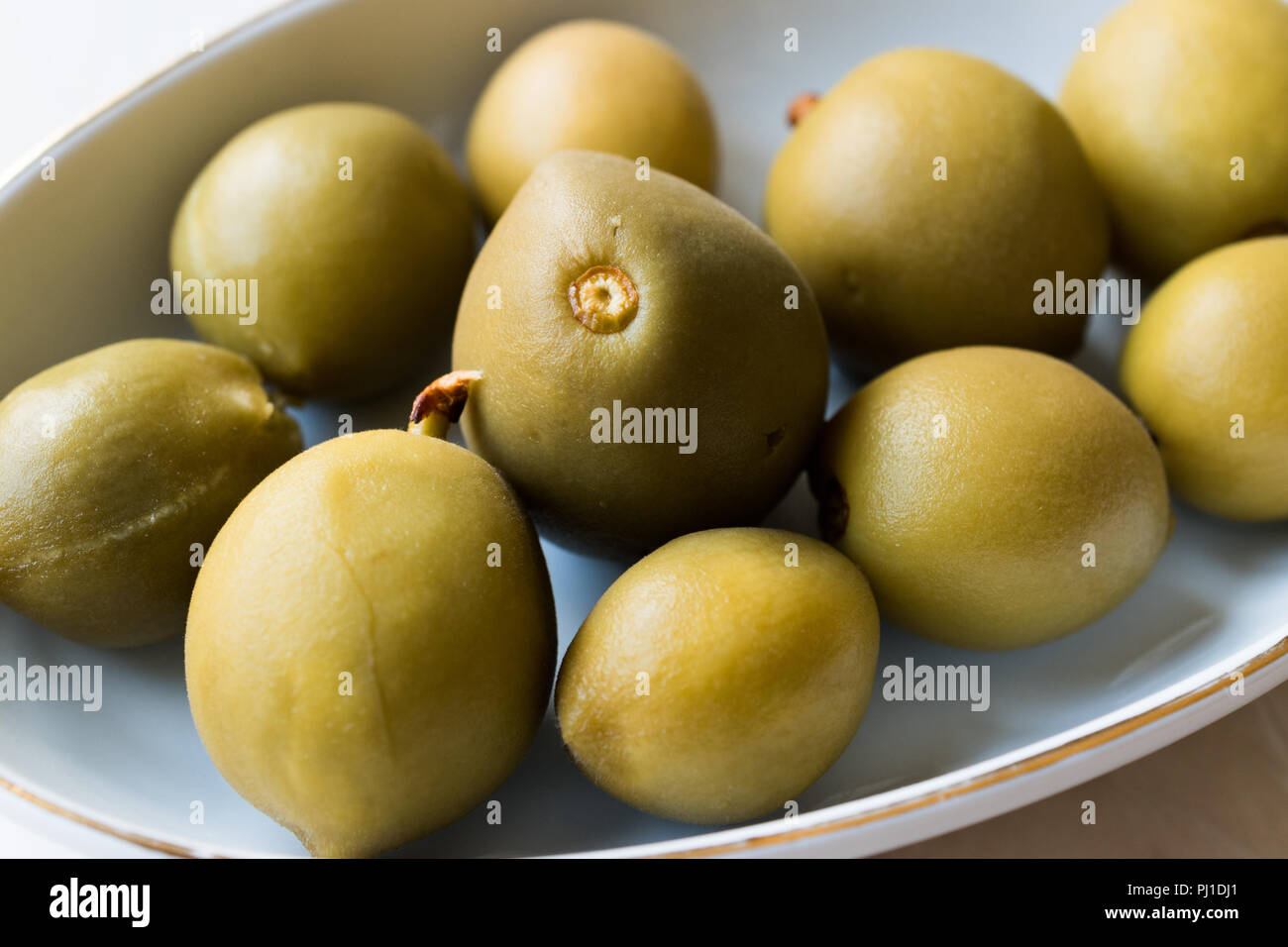 Pickled Unripe Green Almond Pickles in Plate / Cagla Badem. Organic ...