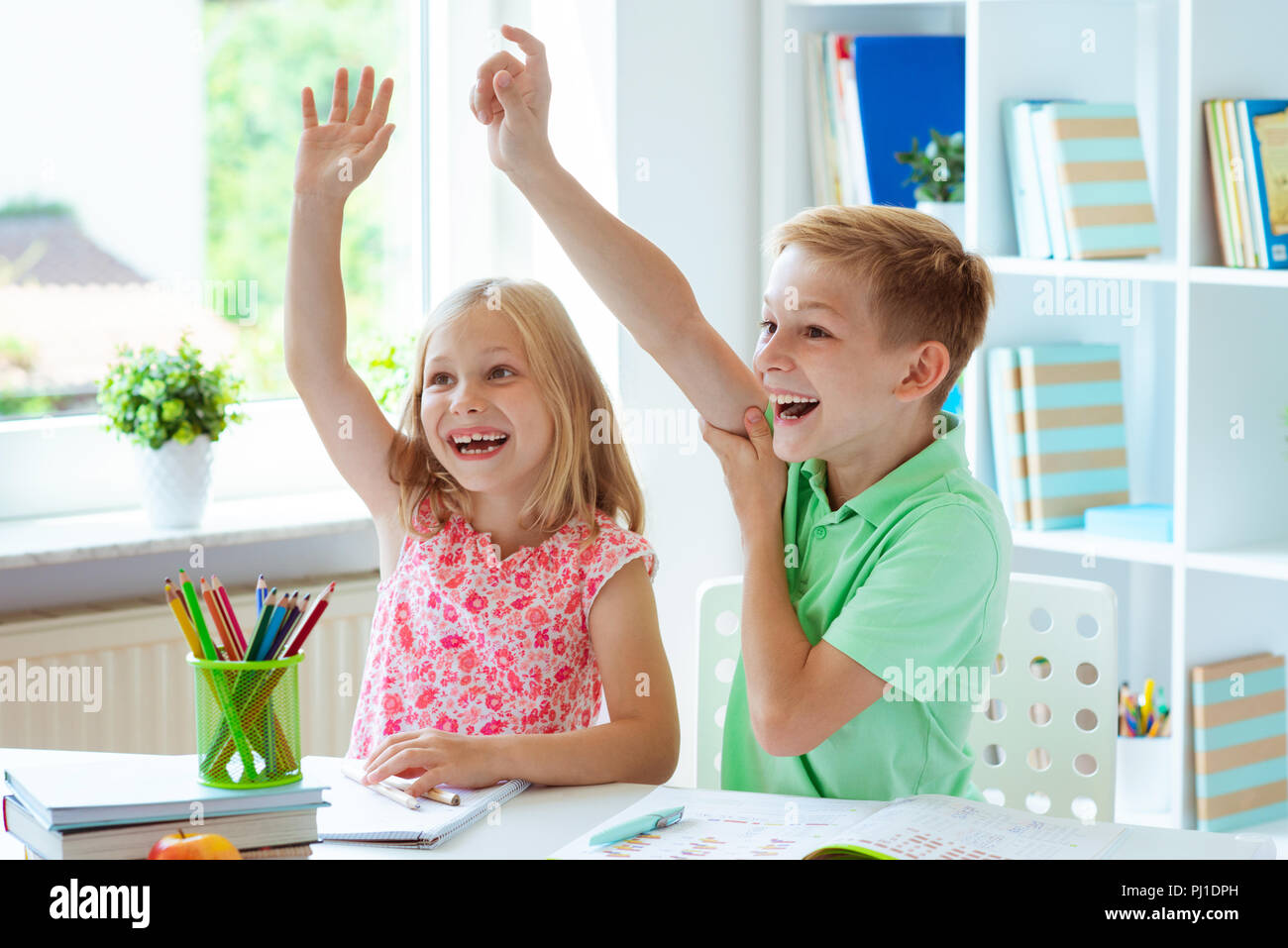 Portrait of happy school children are came back to school and learning ...