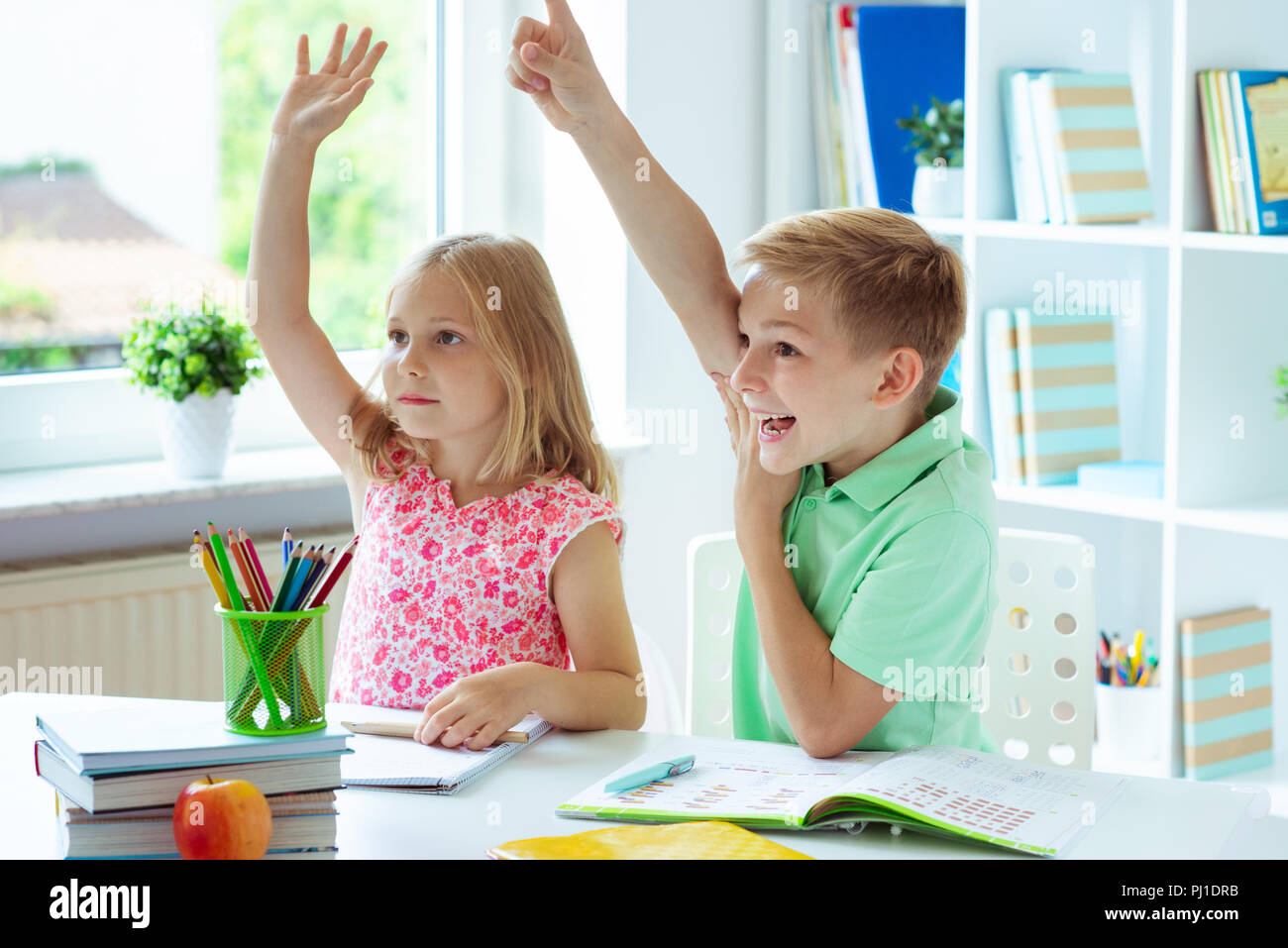 Portrait of happy school children are came back to school and learning ...