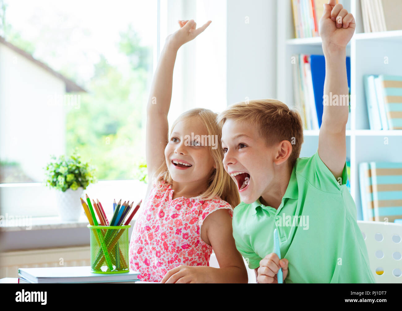 Portrait of happy school children are came back to school and learning ...