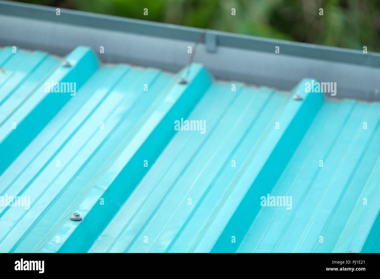 Blue house roof Stock Photo - Alamy