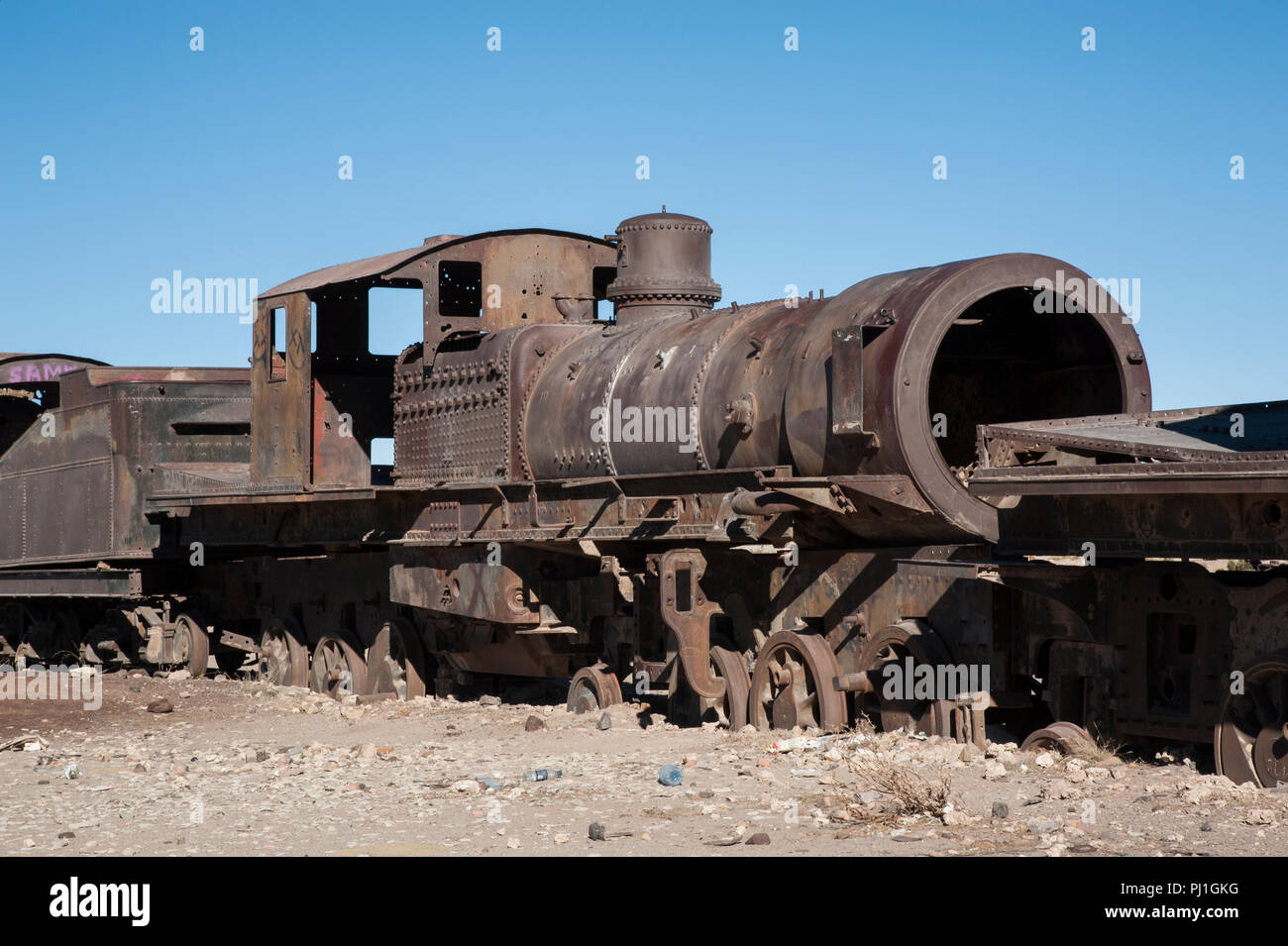 Rusty old and abandoned train at the Cementerio de Trenes in Uyuni ...