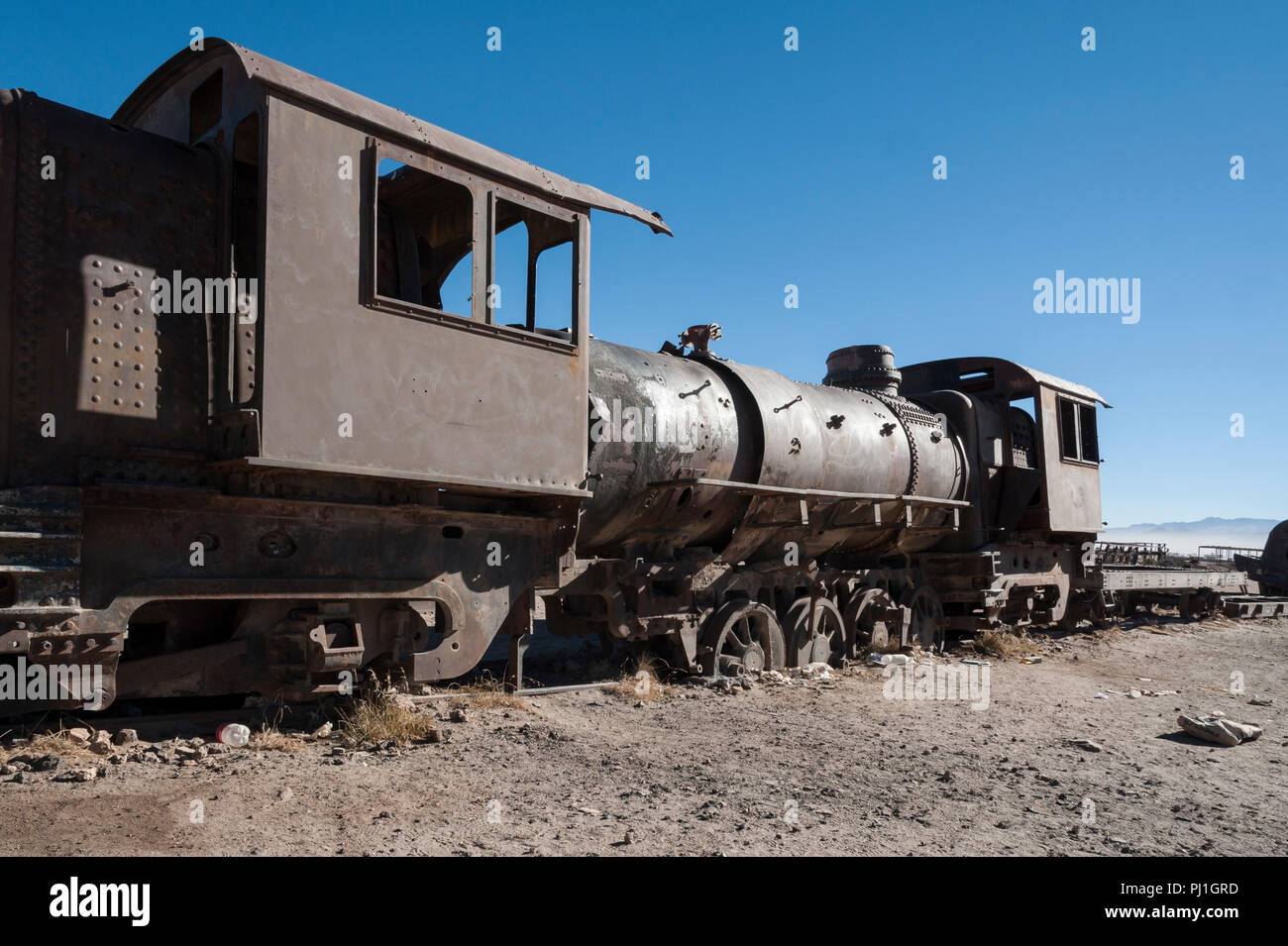 Rusty old and abandoned train at the Cementerio de Trenes in Uyuni ...