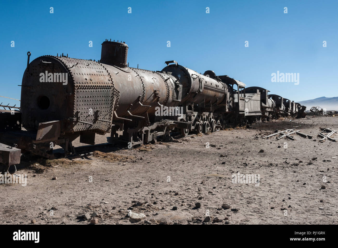 Rusty old and abandoned train at the Cementerio de Trenes in Uyuni ...