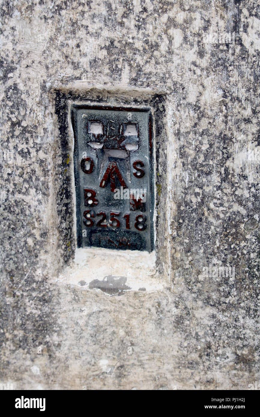 The Ordnance Survey Bench Mark on the side of a British triangulation ...