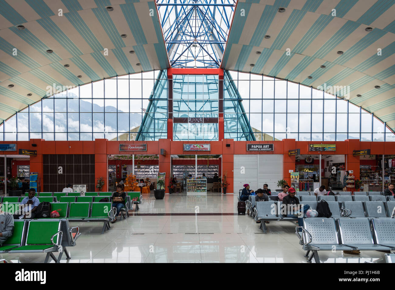 Passengers waiting at the terminal of airport. Wamena, West Papua ...