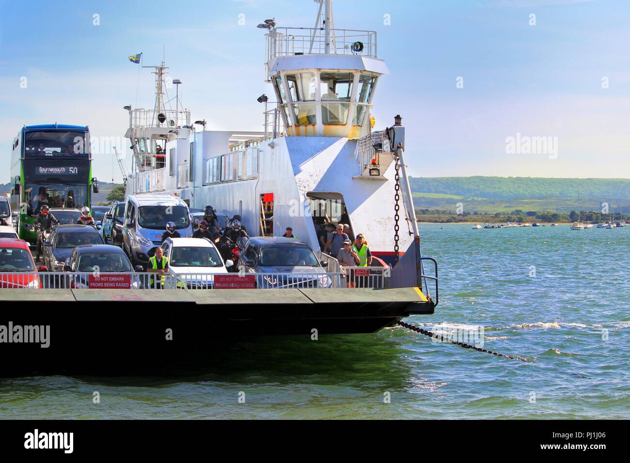 Sandbanks, Dorset, England - June 02 2018: Cars and a bus on board the ...