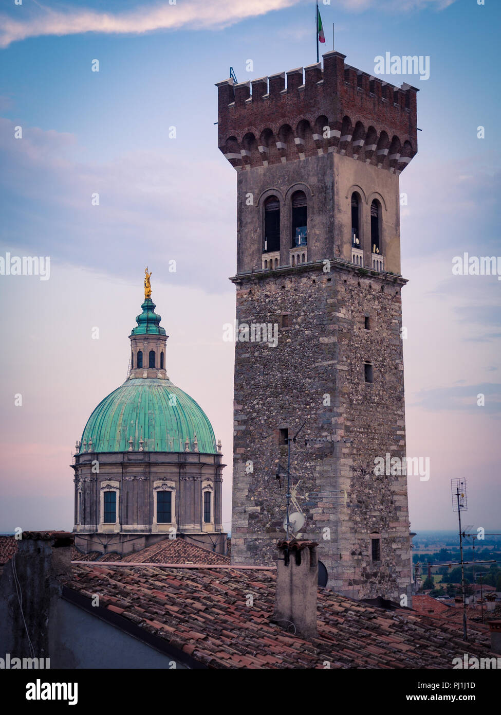 View of the medieval tower and the dome of the Cathedral in Lonato ...