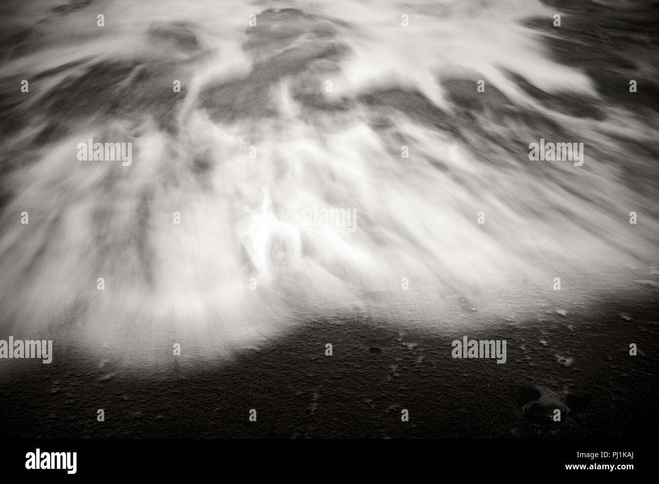 Tide movement on the beach Stock Photo - Alamy