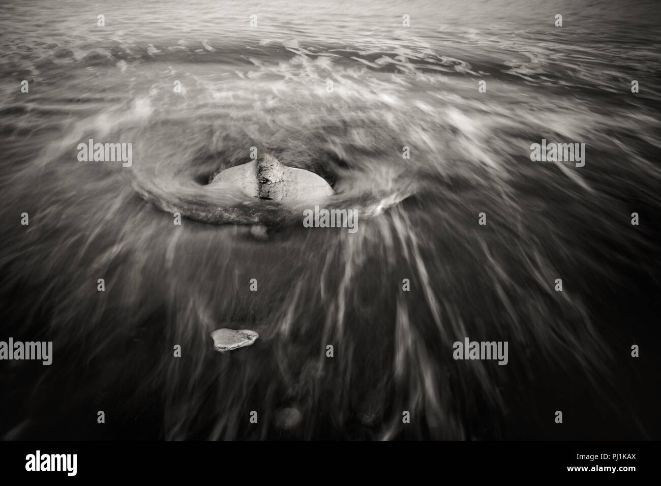 Tide movement on the beach Stock Photo - Alamy