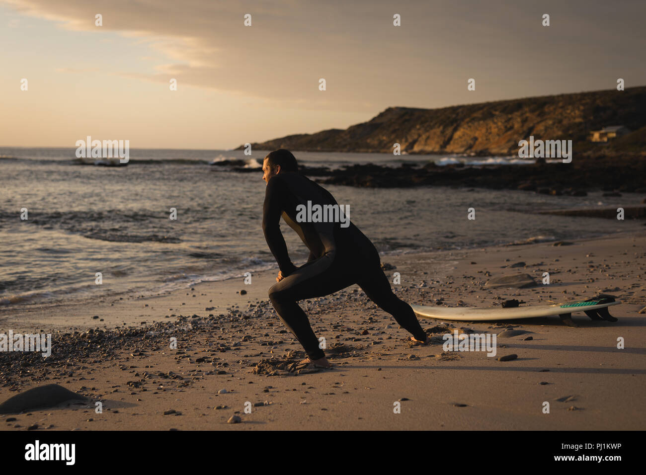Surfer stretching hi-res stock photography and images - Alamy