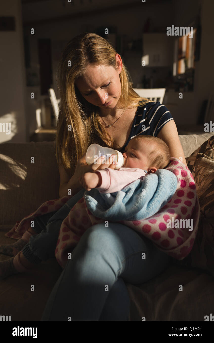 Beautiful blonde woman feeding hi-res stock photography and images - Alamy