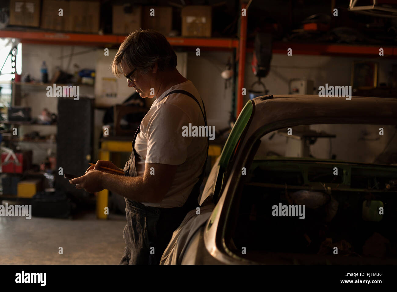 Male texting station hi-res stock photography and images - Alamy