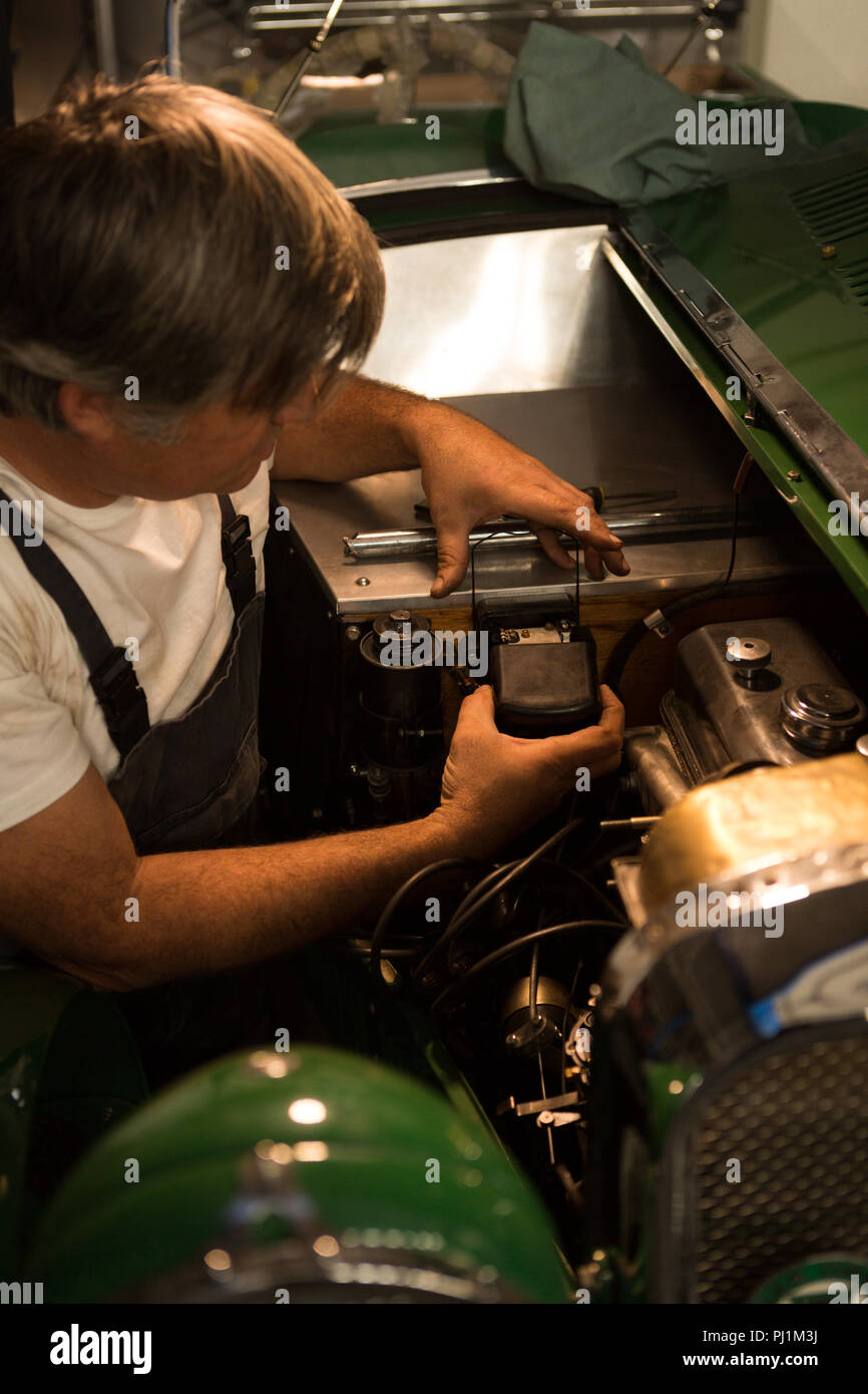 Vintage Car Garage Mechanic Working High Resolution Stock Photography ...