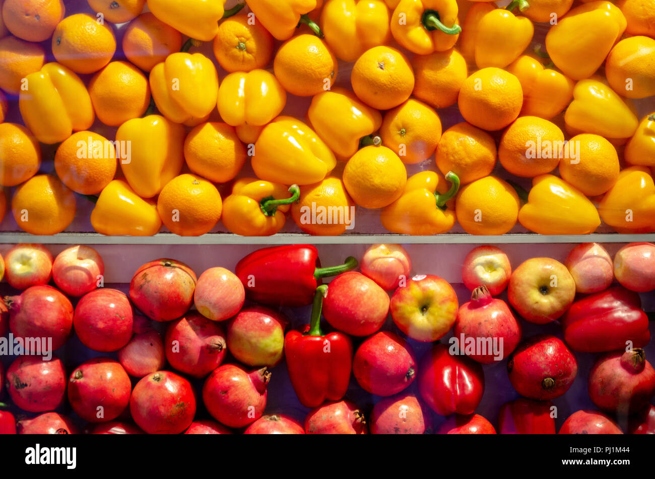 yellow and red fruits background Stock Photo - Alamy