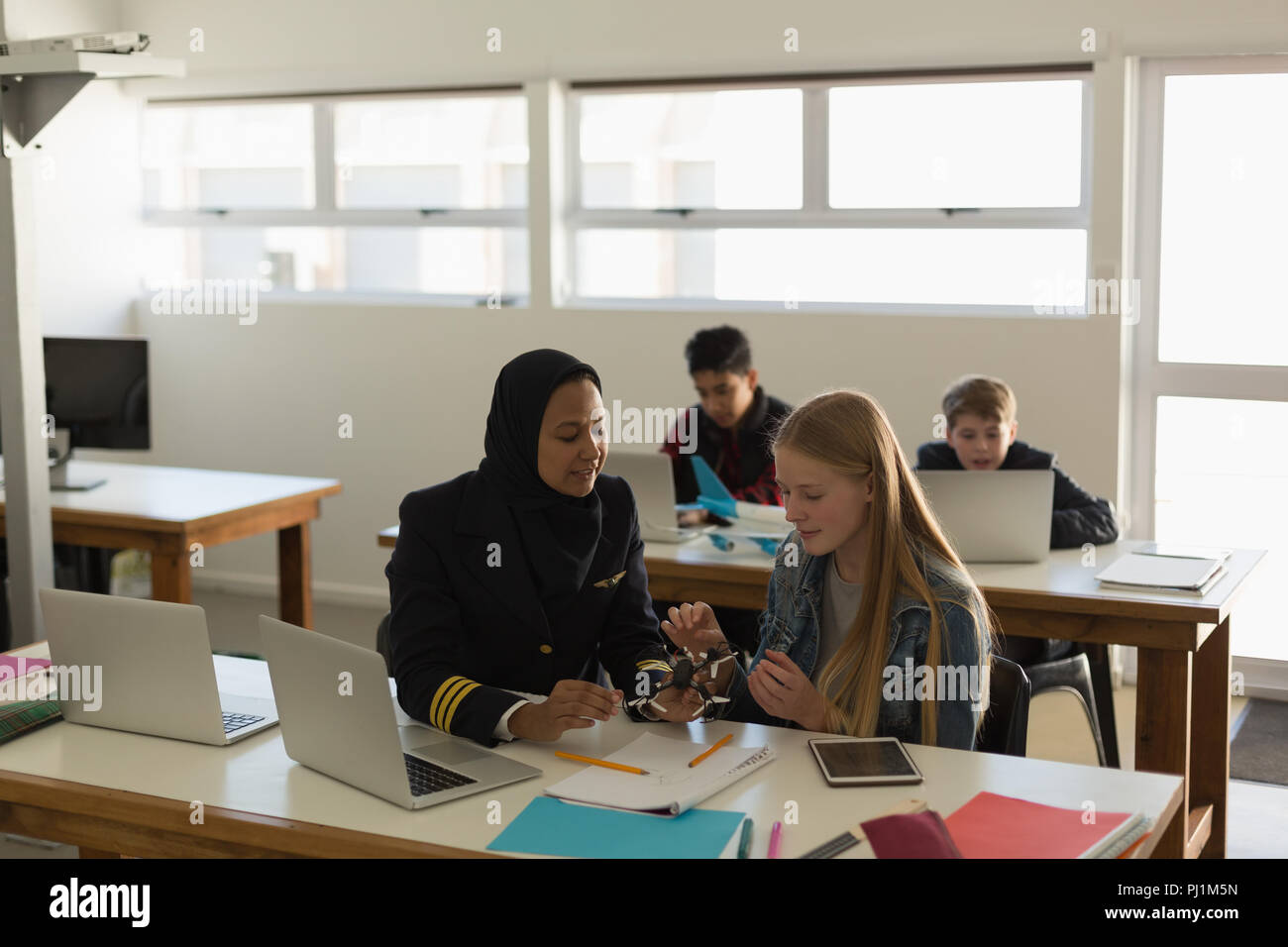 Female mature student holding hi-res stock photography and images - Alamy