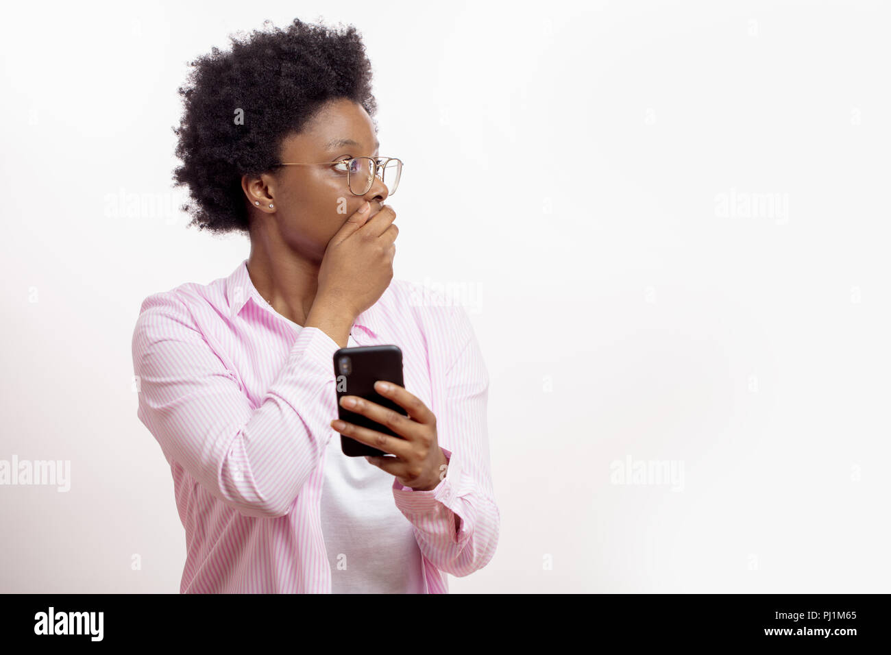 Woman hand covering mouth glasses hi-res stock photography and images ...