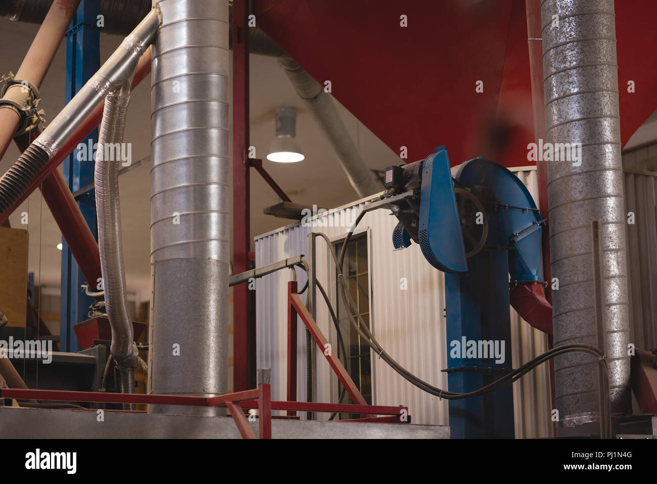 Machines in warehouse Stock Photo - Alamy