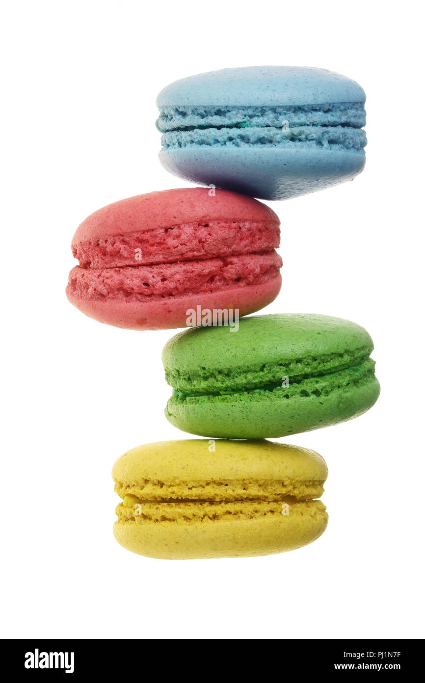 colored macarons isolated on white background without a shadow closeup ...
