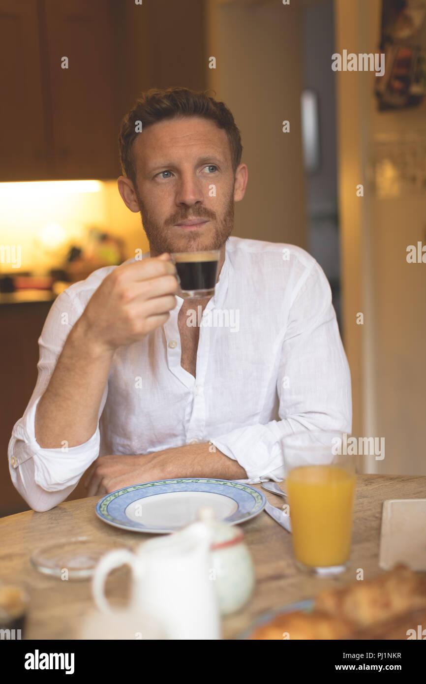 Coffee black man thinking hi-res stock photography and images - Alamy
